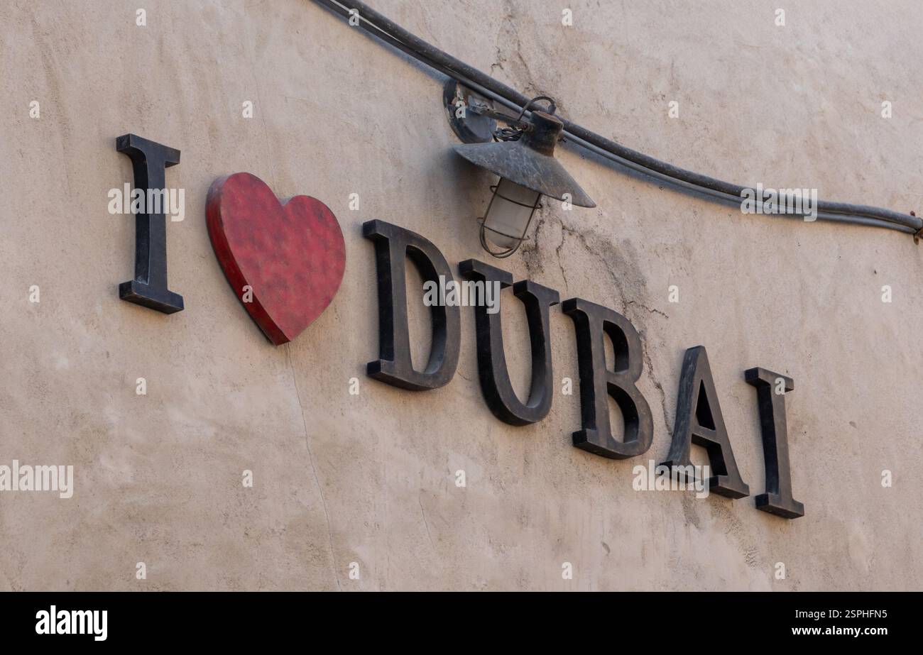 "I Love Dubai" text displayed on a rustic wall in Al Seef, the heritage ...
