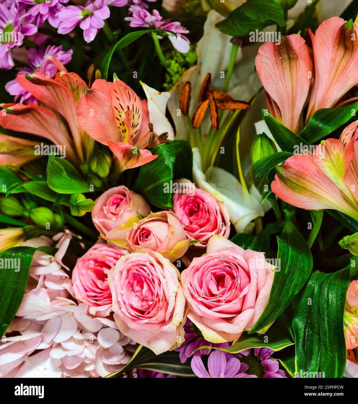 Stunningly beautiful pink roses in one bouquet together with other ...