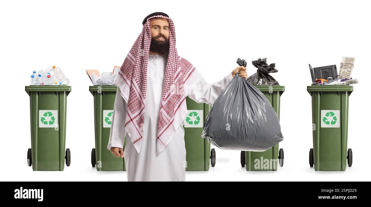Saudi arab man in a traditional dishdasha robe with recycle bins ...