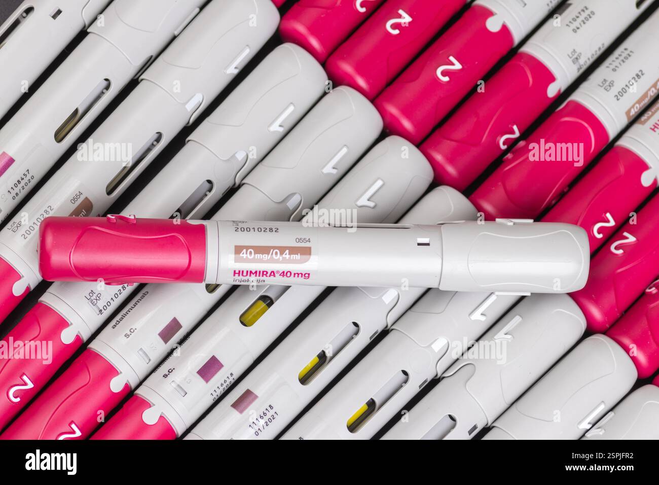 Humira injection pens displayed in an organized manner, showcasing ...
