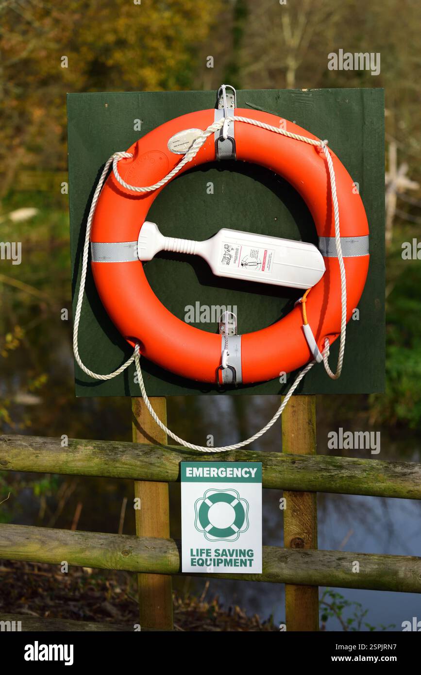 Life saving equipment beside a pond at Paignton zoo Stock Photo - Alamy