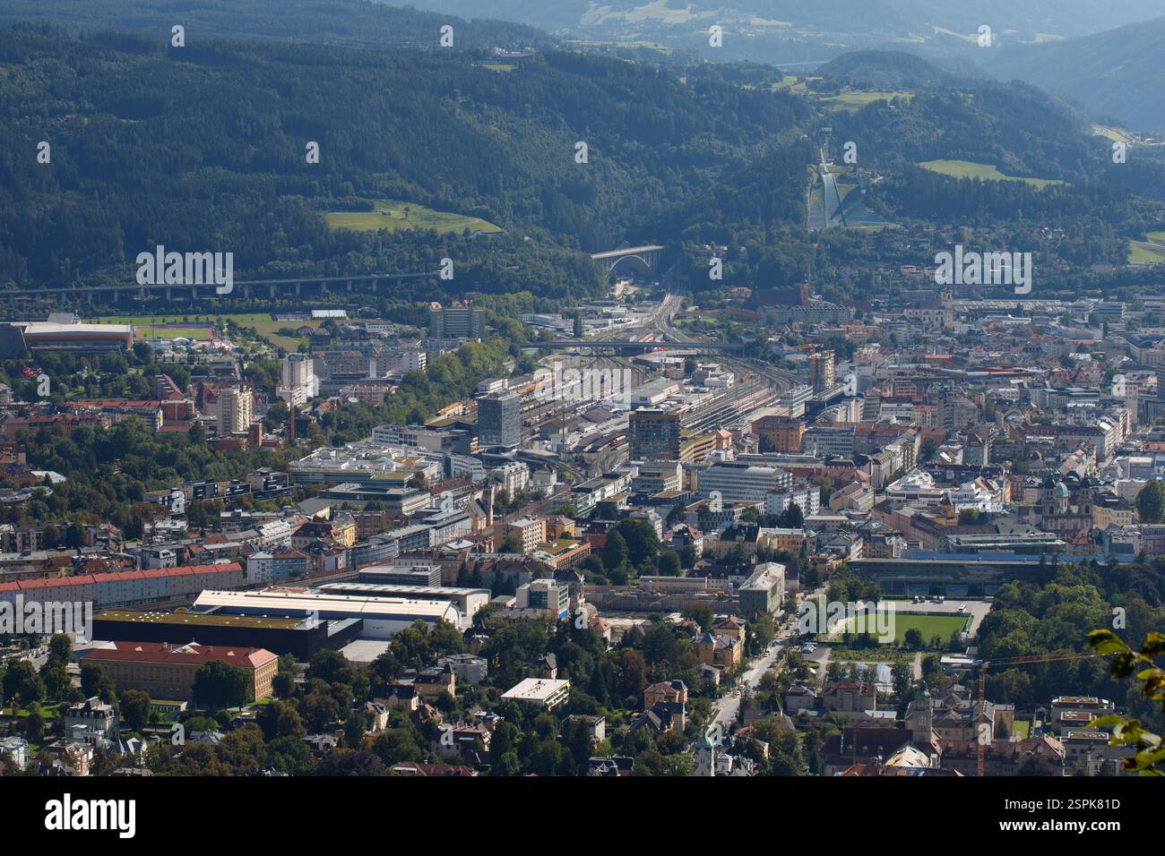 High-angle, long shot of Innsbruck, Austria. The image showcases the ...