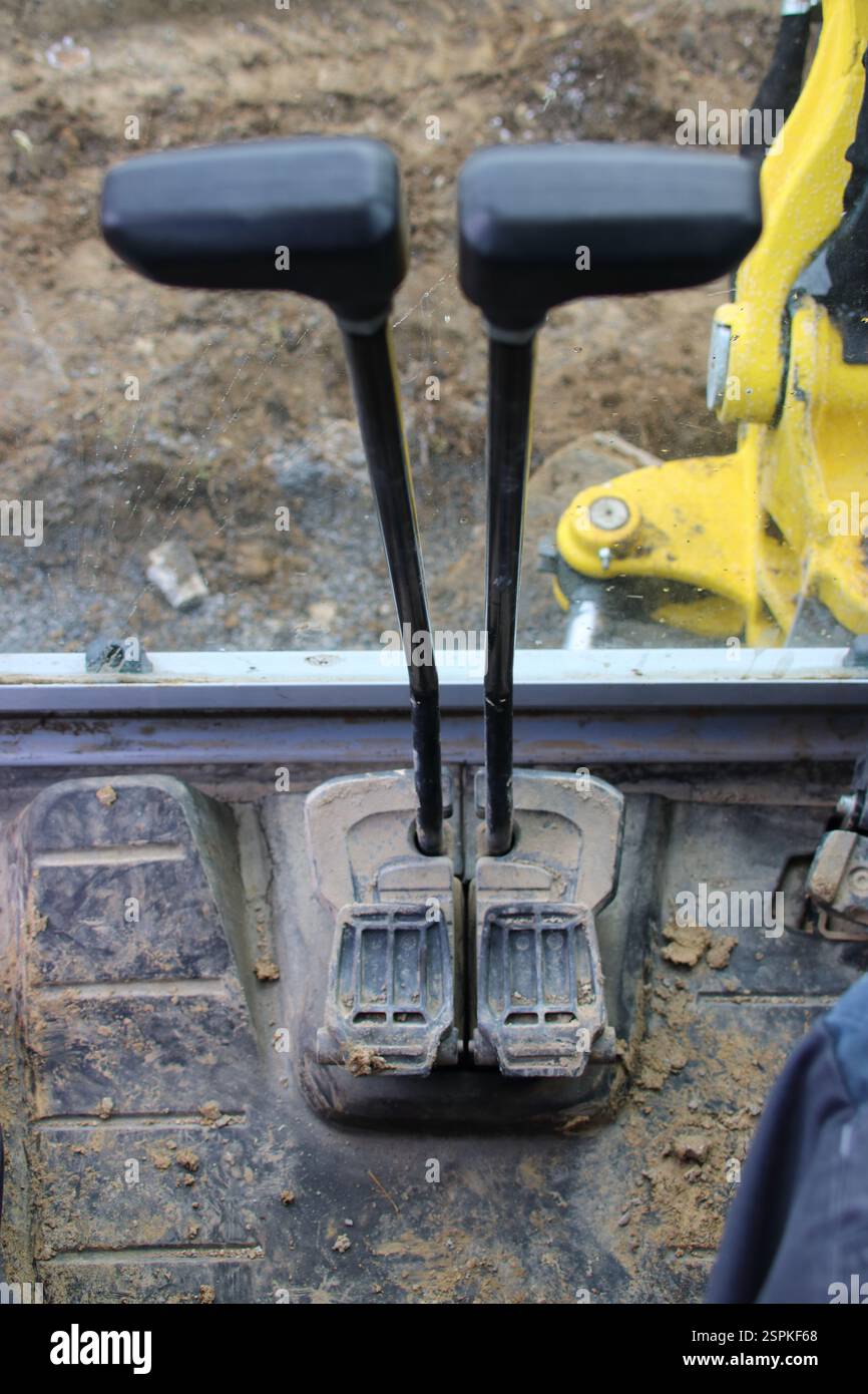 Lever for controlling an excavator with your hands Stock Photo - Alamy