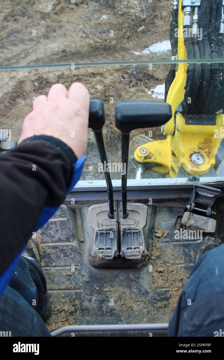Lever for controlling an excavator with your hands Stock Photo - Alamy