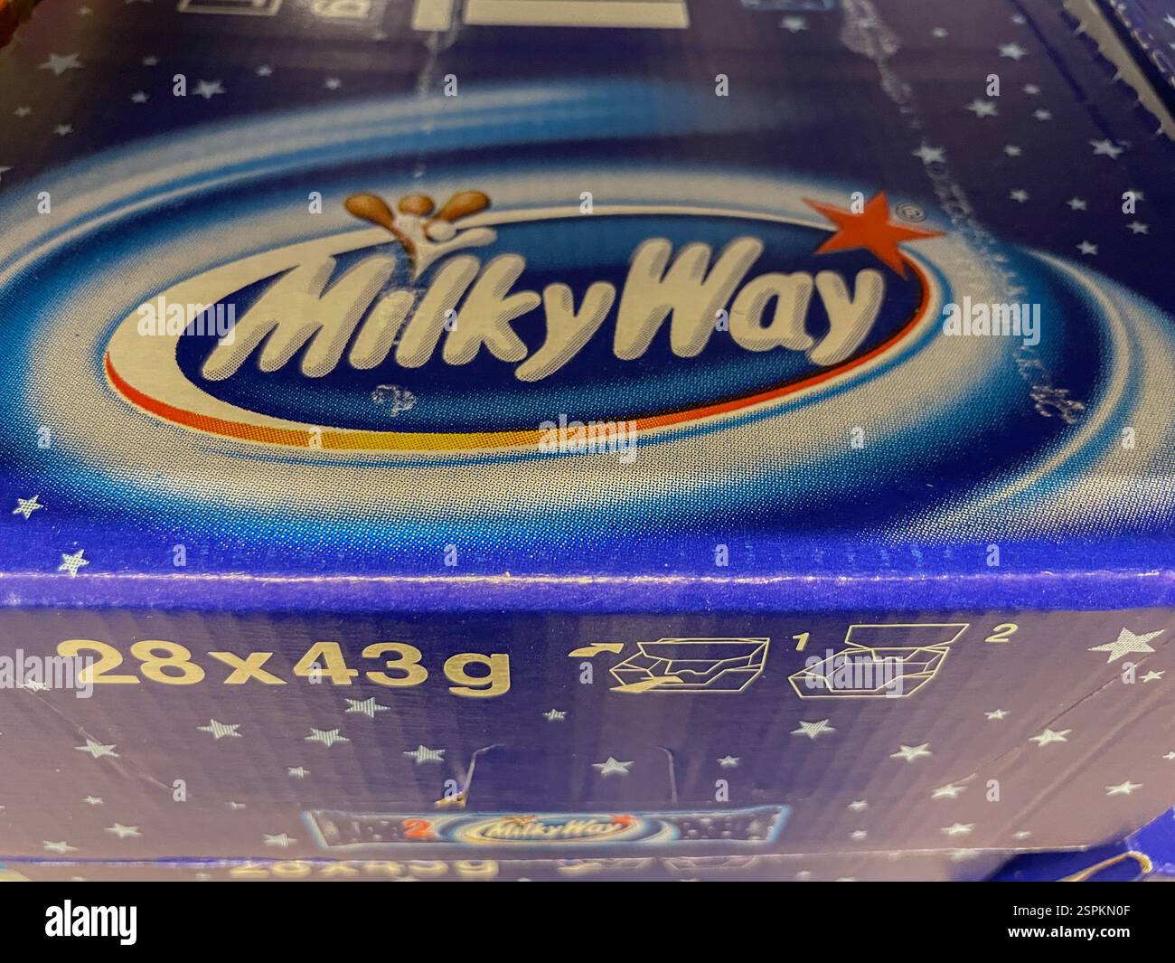 Close-up view of a blue Milky Way chocolate bar box. The box displays ...