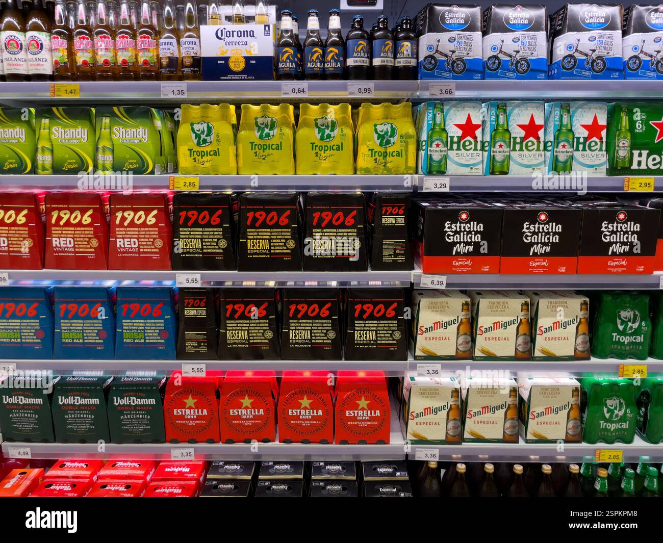 A supermarket shelf displays various brands of beer, including Corona ...