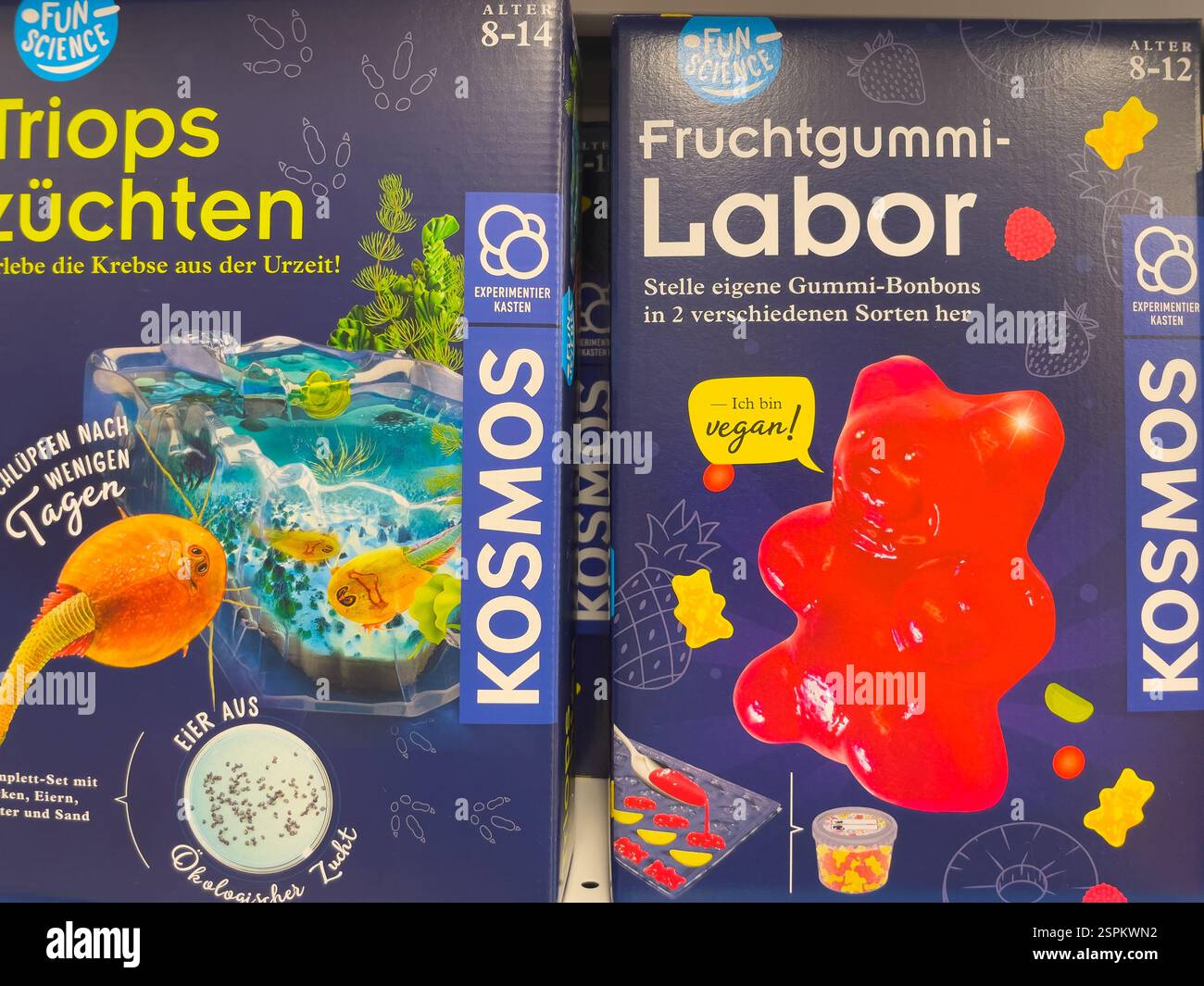Two KOSMOS brand experiment kits are shown. One features triops ...