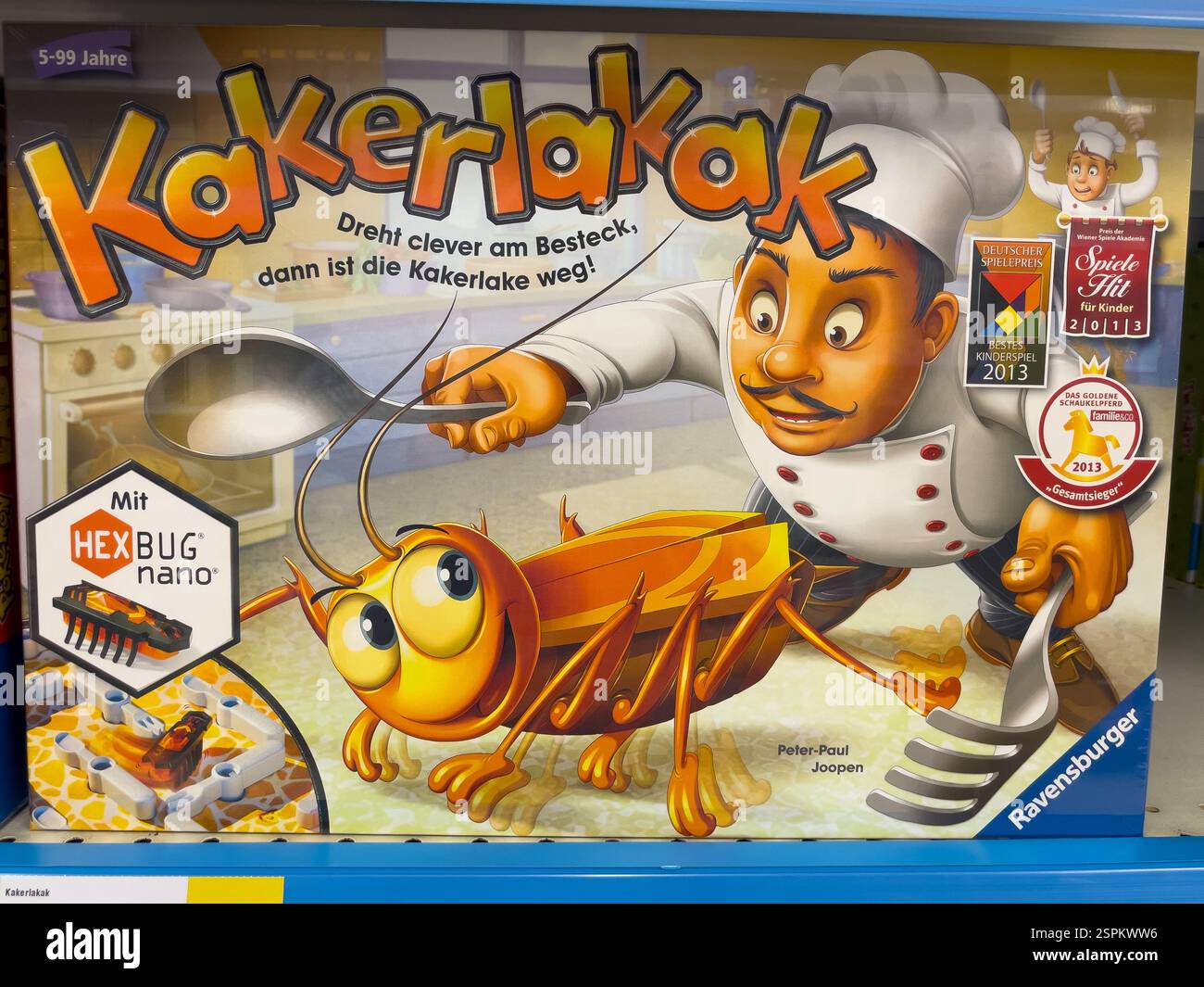 Board game box featuring a cartoon chef and a large cockroach. Bright ...