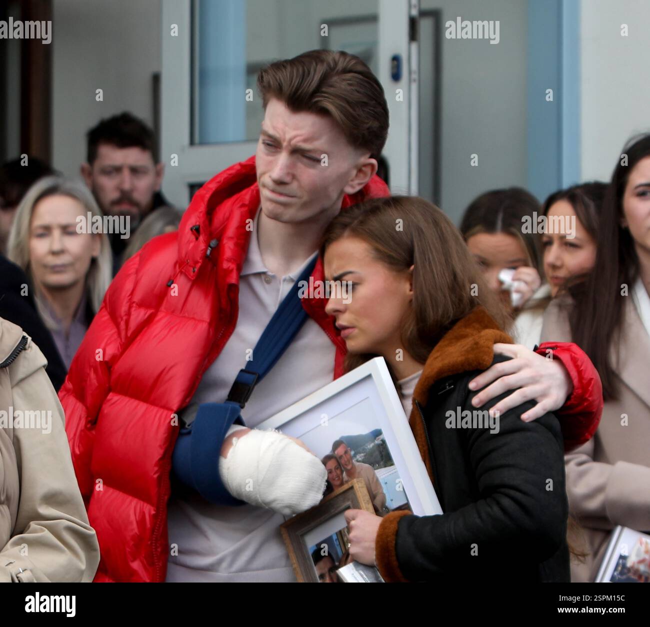John Cooney's fiancee Emmaleen, and his brother Aaron at his funeral ...