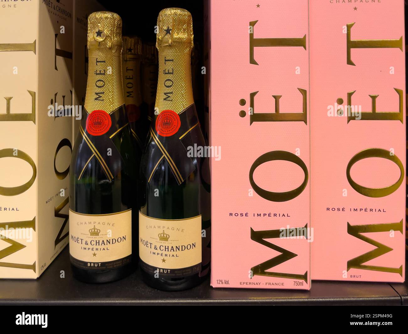 Close-up of two Moët & Chandon Imperial Brut champagne bottles ...