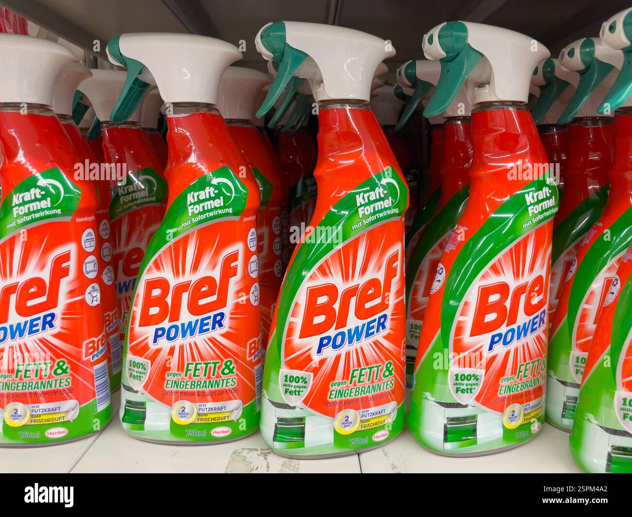 A shelf displays multiple identical bottles of Breff Power cleaner. The ...