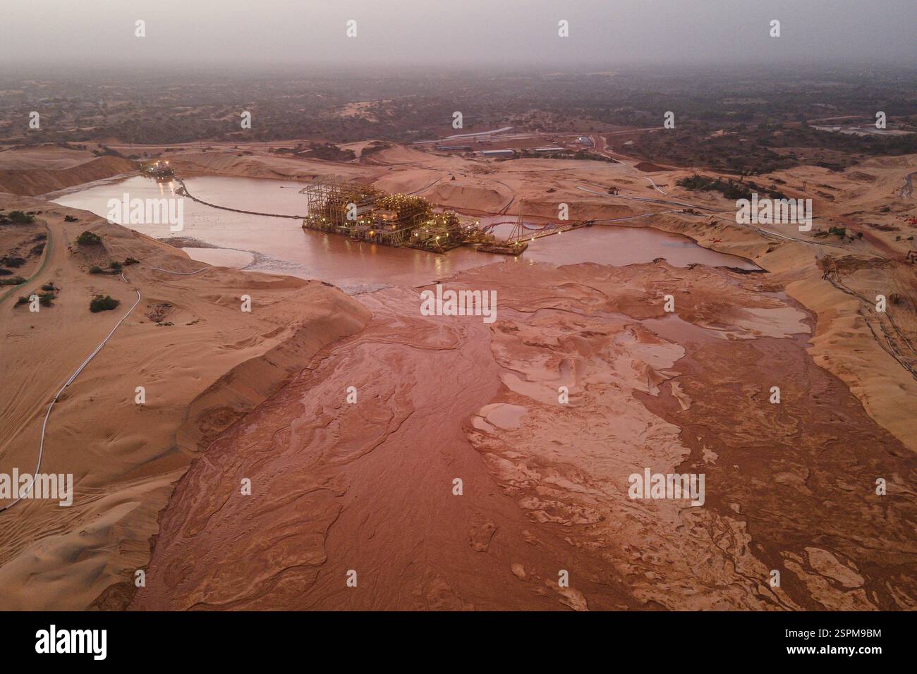 Aerial view of the ERAMET GCO mine and its floating plant on December ...