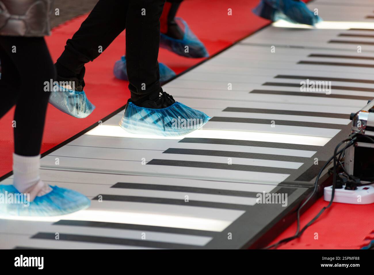 Italy, Children Play on the Giant Piano Keyboard Stock Photo - Alamy