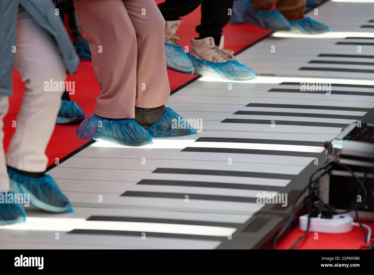 Italy, Children Play on the Giant Piano Keyboard Stock Photo - Alamy