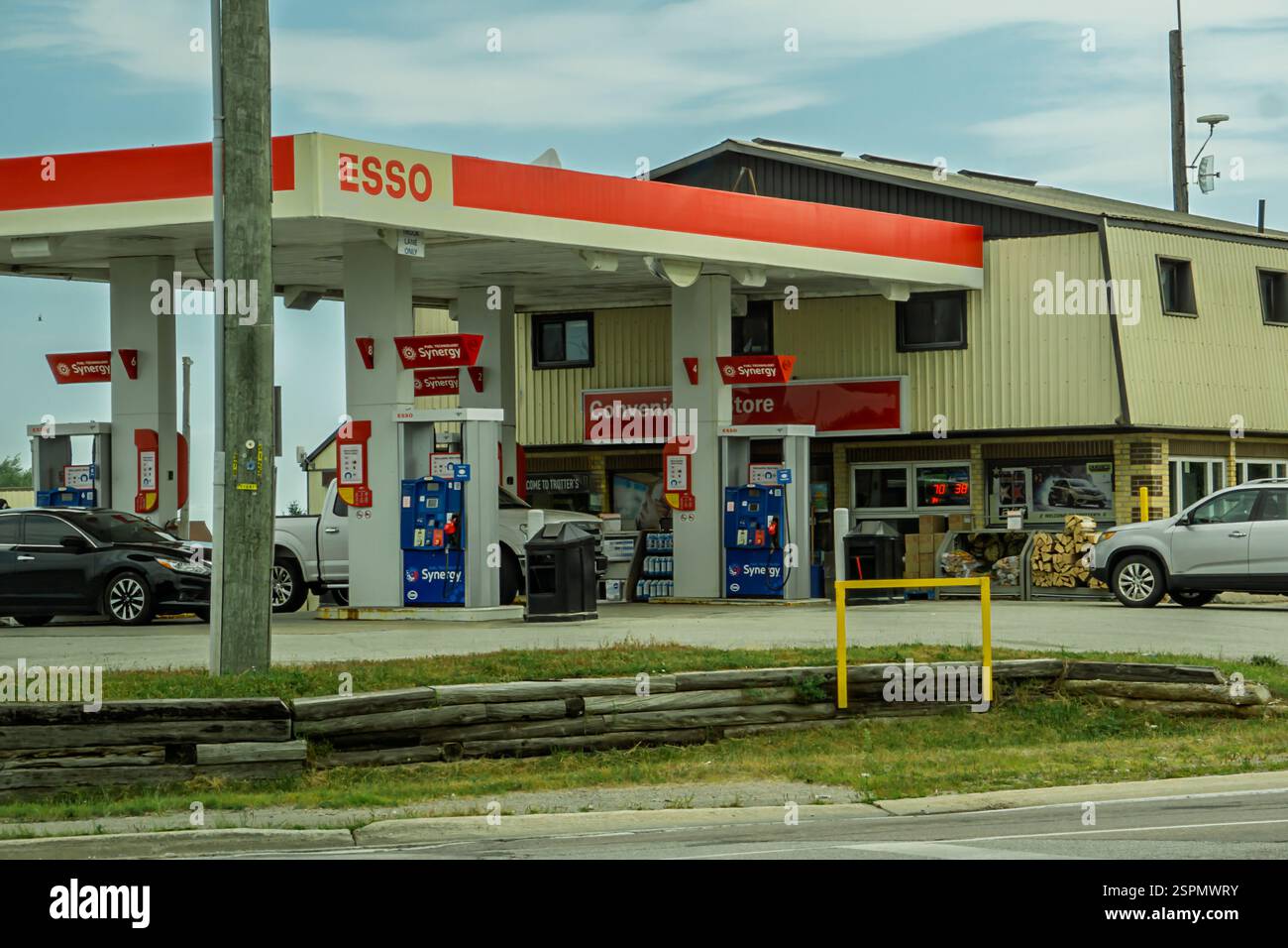 05AUG2024 - A convenience store operating also as an Esso gas station ...