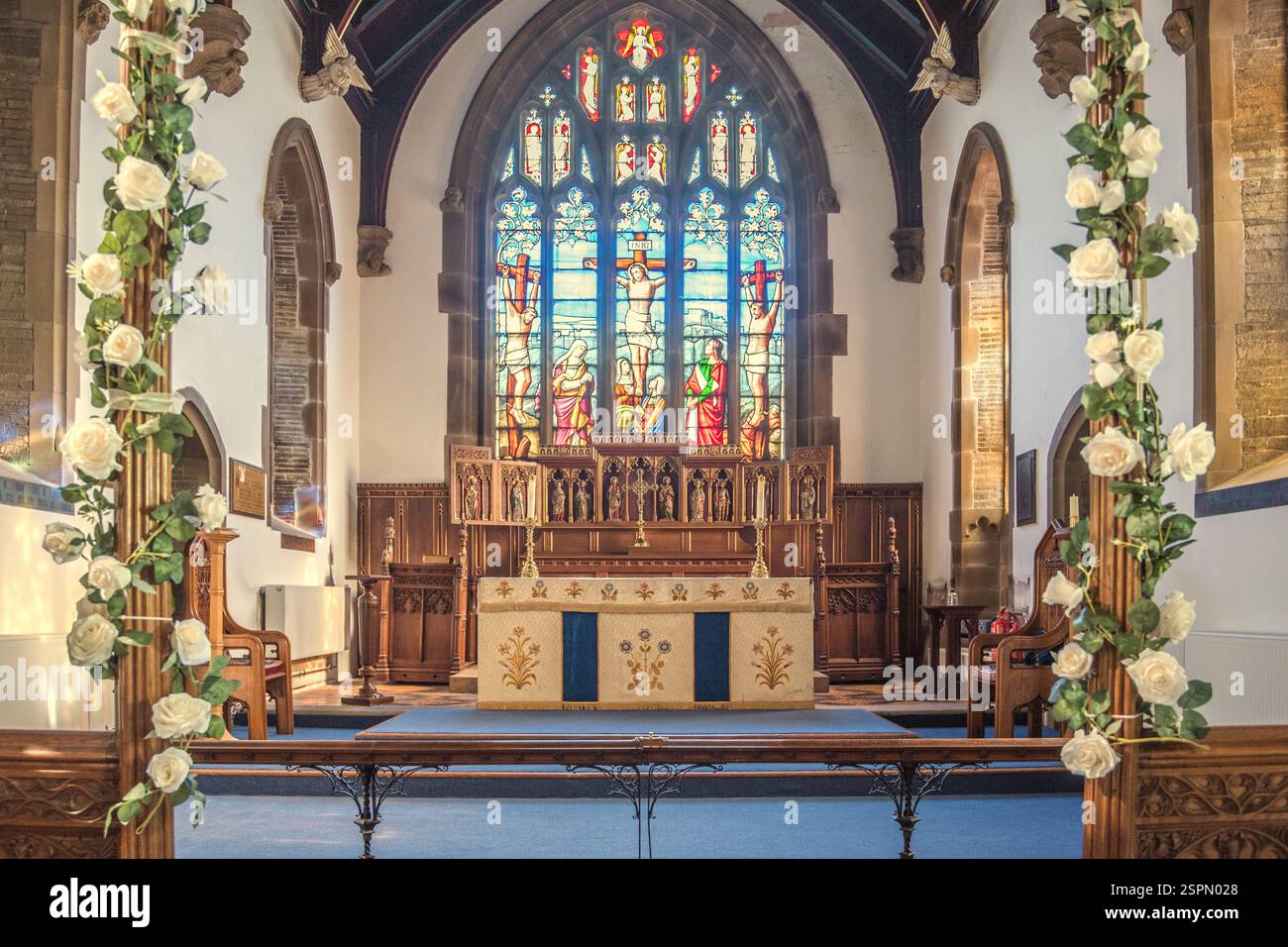 The main altar stained glass windows in the church of St Andrew ...
