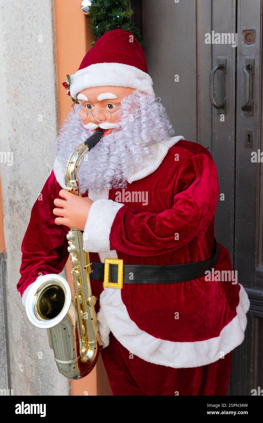 Santa Claus Mannequin Playing the Saxophone Stock Photo - Alamy