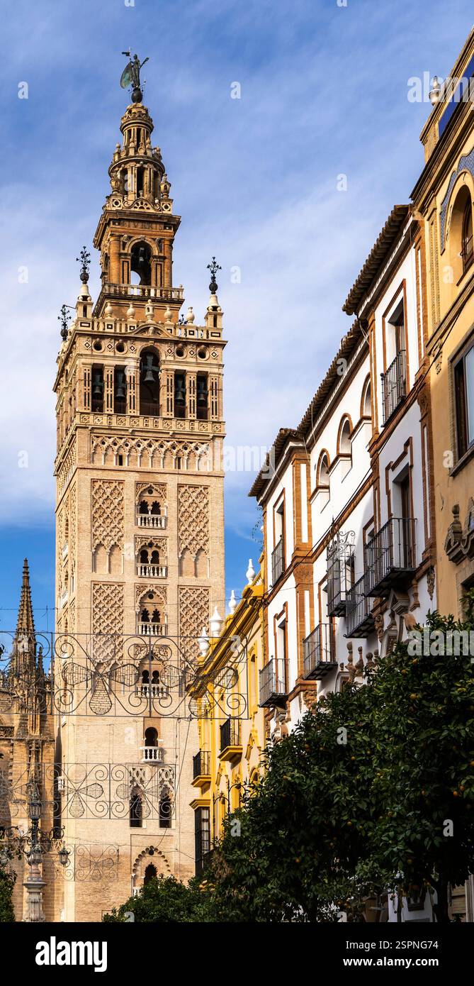 A tall historic bell tower with intricate architectural details ...