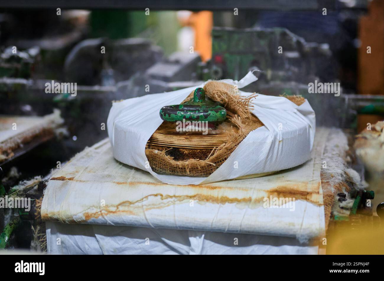 Exploring the intricate process of a felting machine workshop where ...