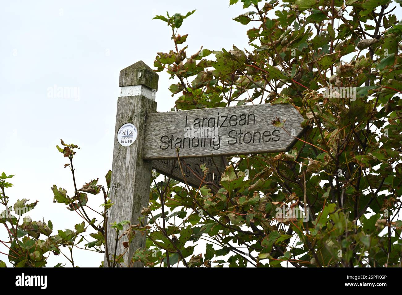 Wooden footpath sign to Largizean Farm stones Bute, Scotland Stock ...