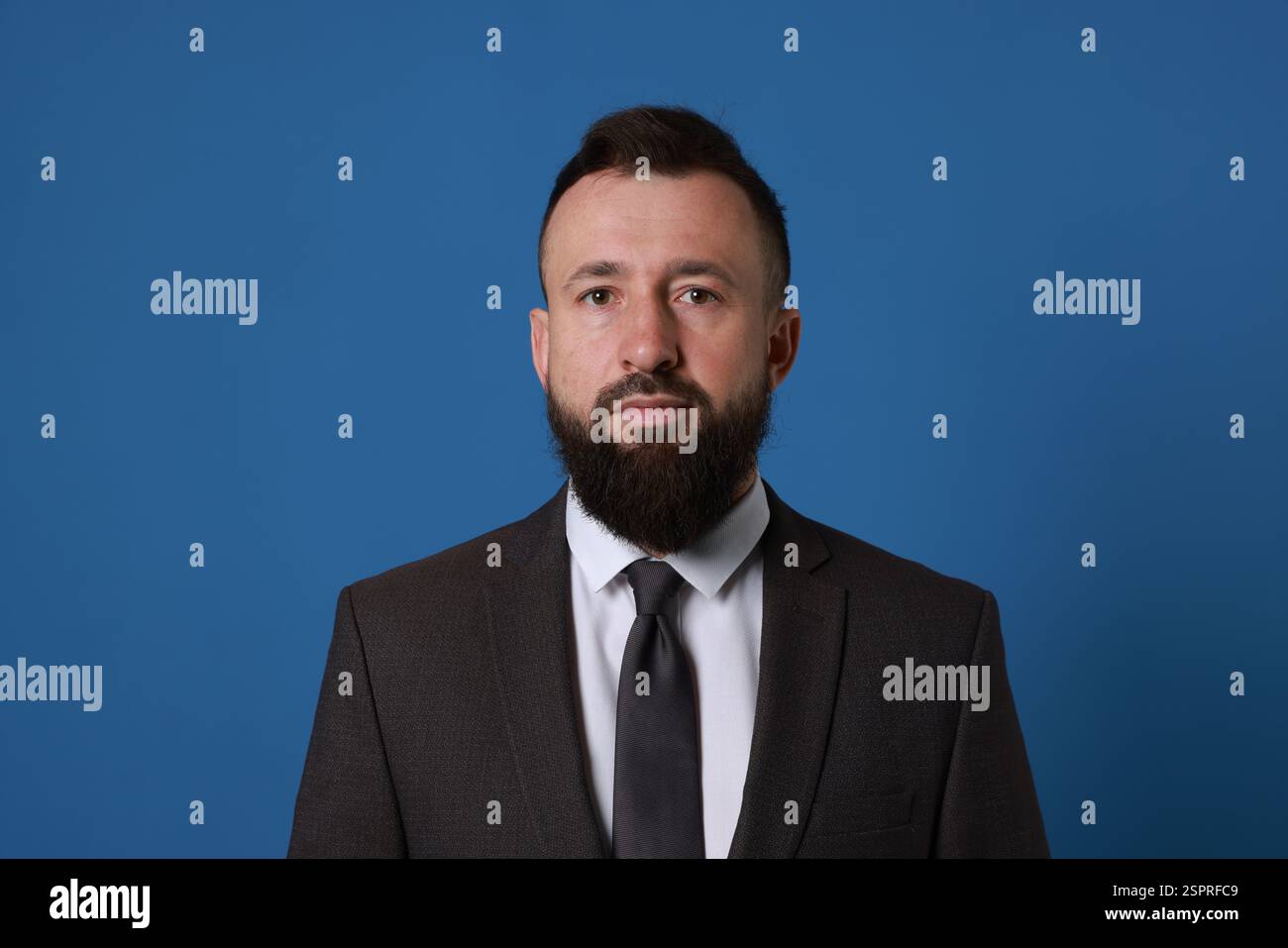 Bearded man in blue suit hi-res stock photography and images - Alamy