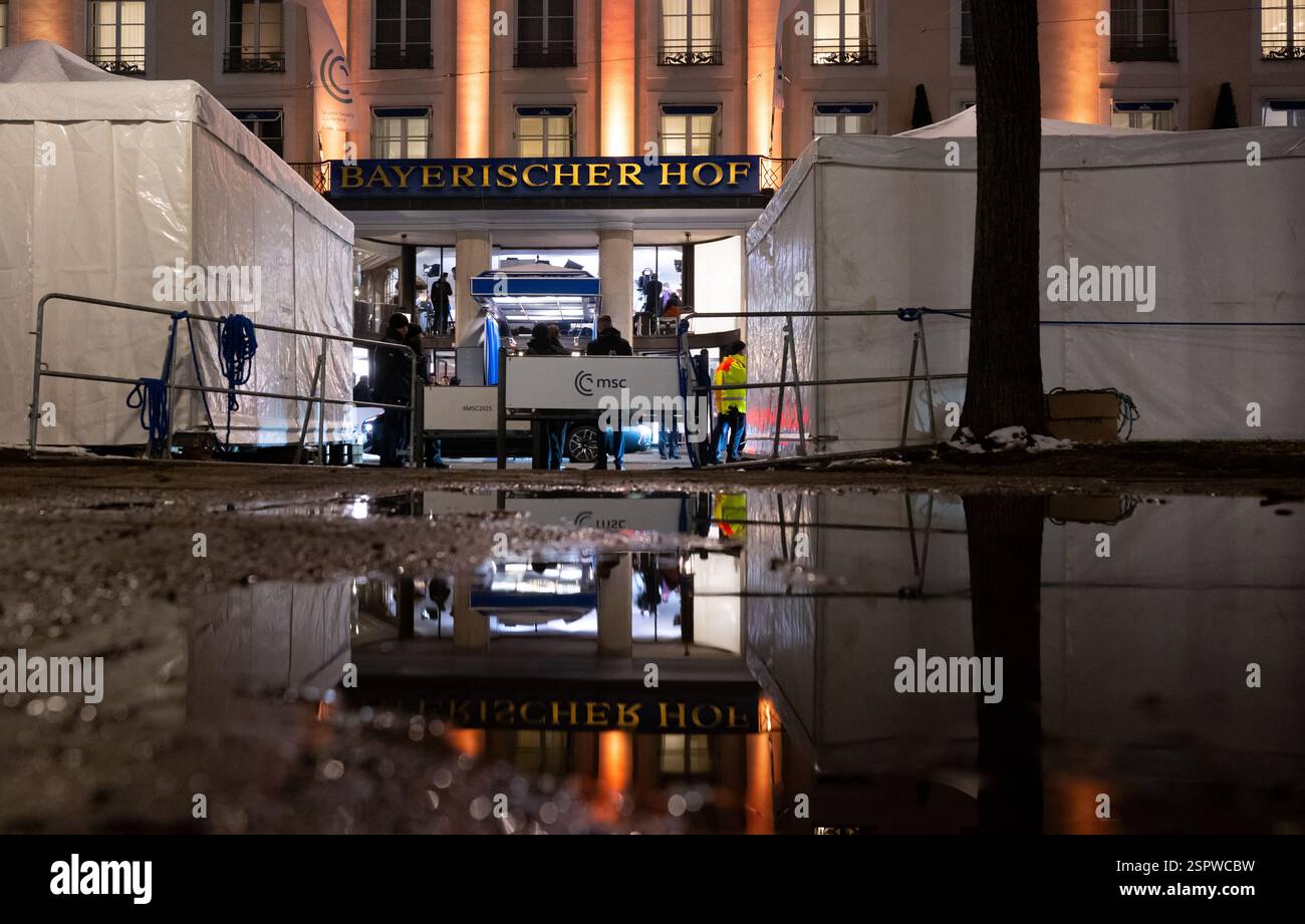 Munich, Germany. 14th Feb, 2025. Police officers stand in front of the ...