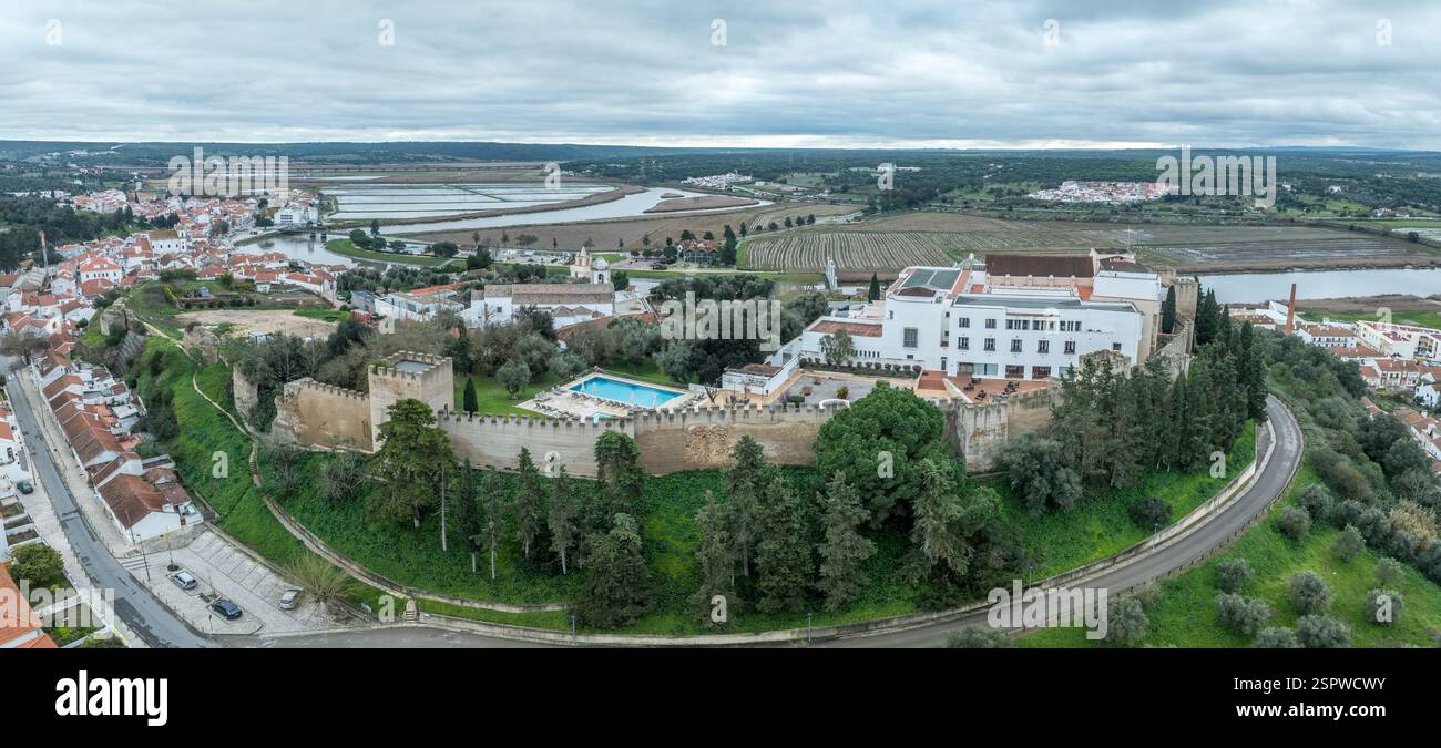 Aerial view of Alcacer do Sal medieval hilltop castle above the Sado ...
