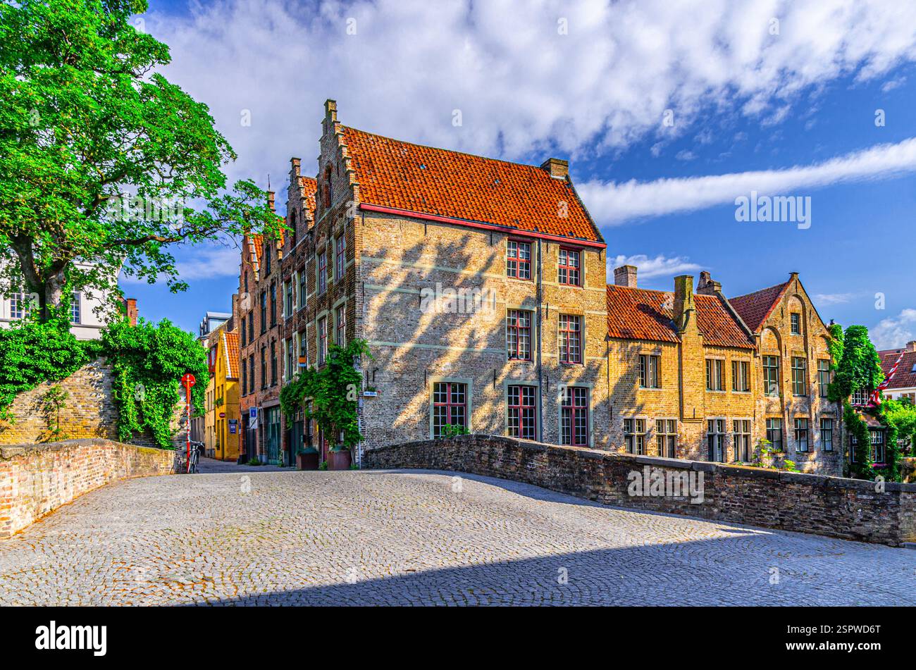 Meebrug stone bridge road across Groenerei Green Canal, promenade ...