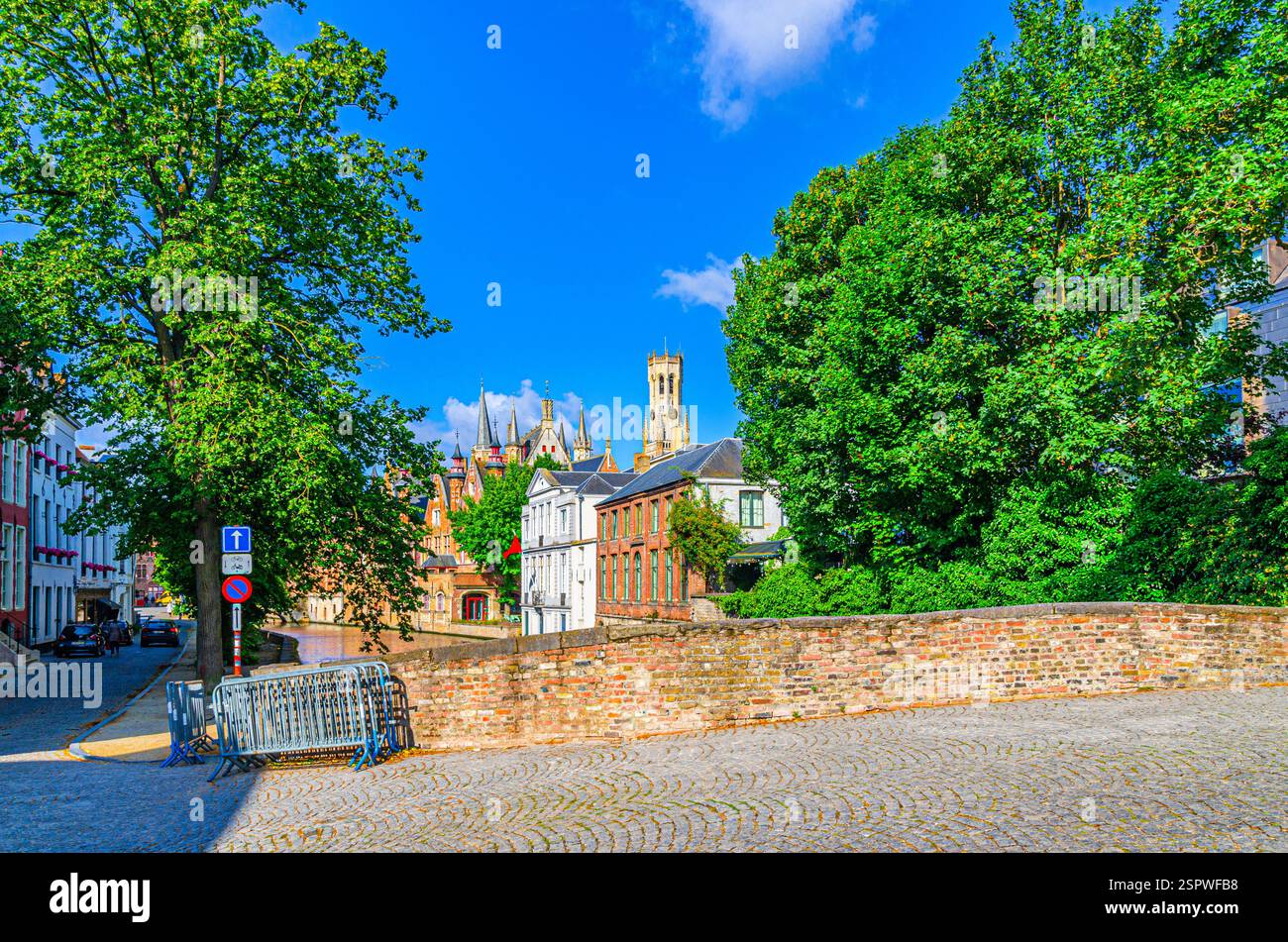 Meebrug stone bridge road across Groenerei Green Canal with trees and ...