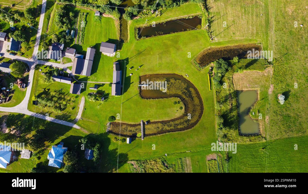 Aerial View of Rural Landscape with Ponds and Houses Stock Photo - Alamy