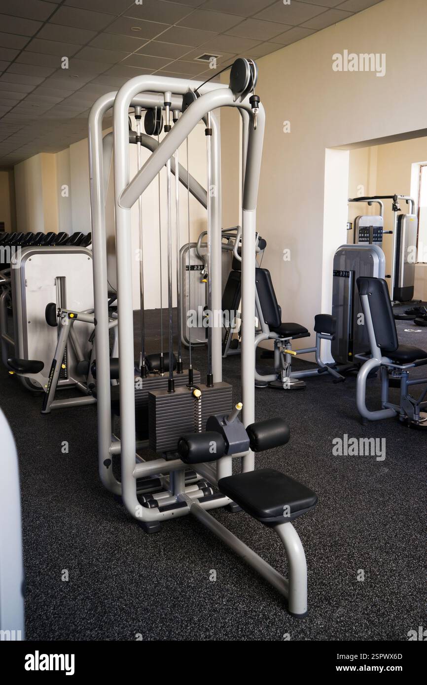 Selection of different exercise machines at the gym Stock Photo - Alamy