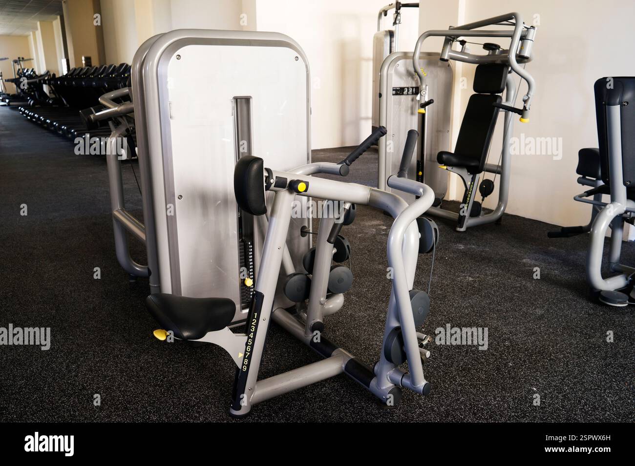 Selection of different exercise machines at the gym Stock Photo - Alamy