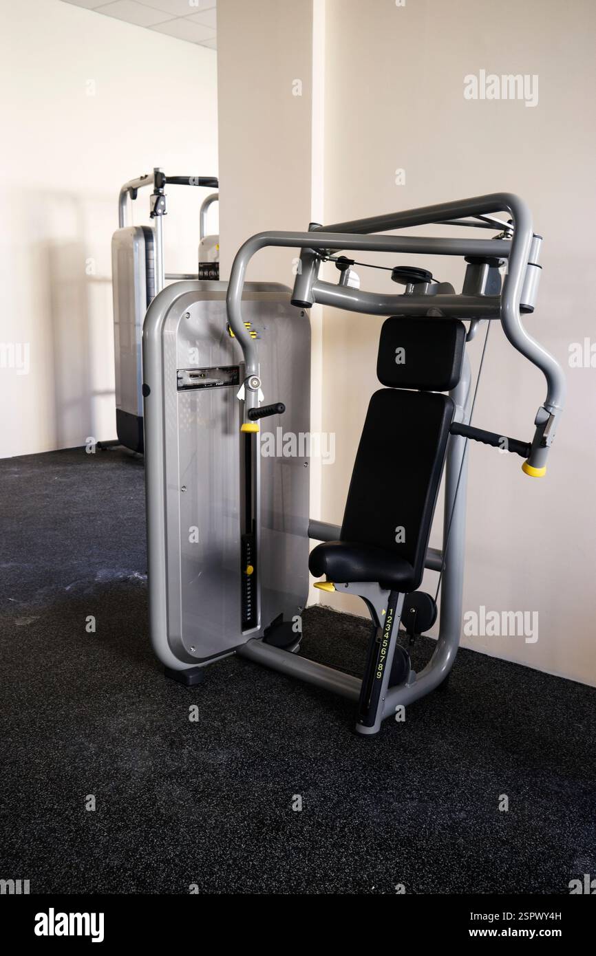 Selection of different exercise machines at the gym Stock Photo - Alamy