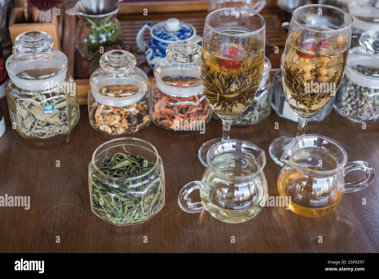 Collection of teas in jars and Chinese Flower teas blooming in wine ...