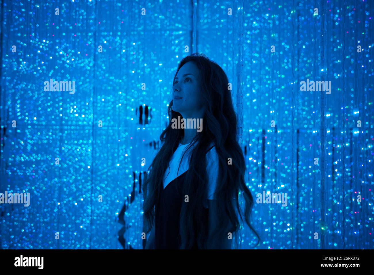 Woman Immersed in Blue Digital Light Art at TeamLab Tokyo Stock Photo ...