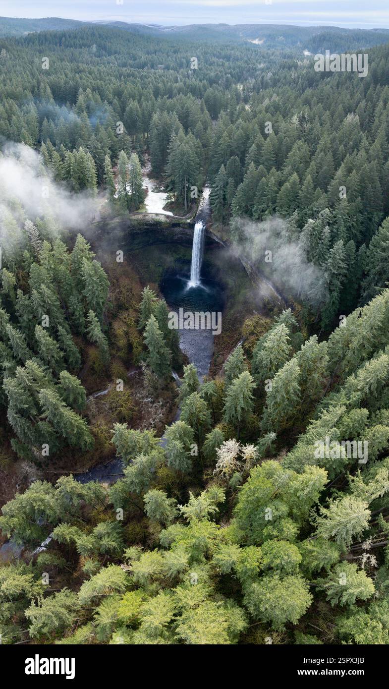 Mist drifts above the magnificent South Falls in Oregon. The entire ...
