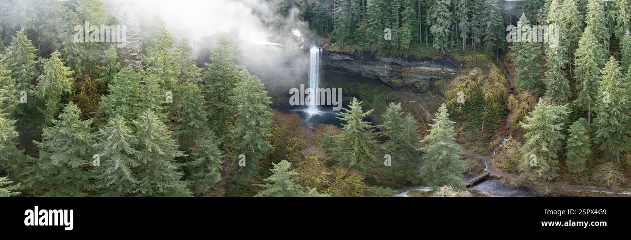 Mist drifts above the magnificent South Falls in Oregon. The entire ...