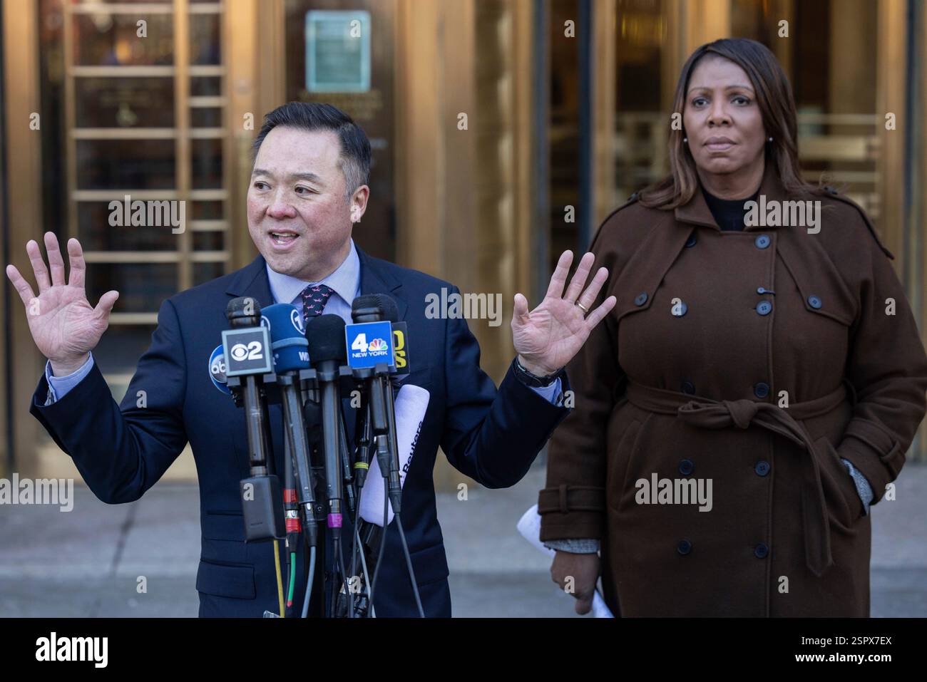 Connecticut Attorney General William Tong, left, speaks during a news ...