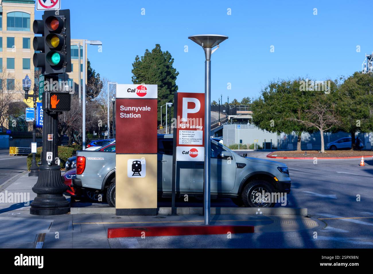 Sunnyvale Caltrain Station outdoors parking signage, a traffic light ...