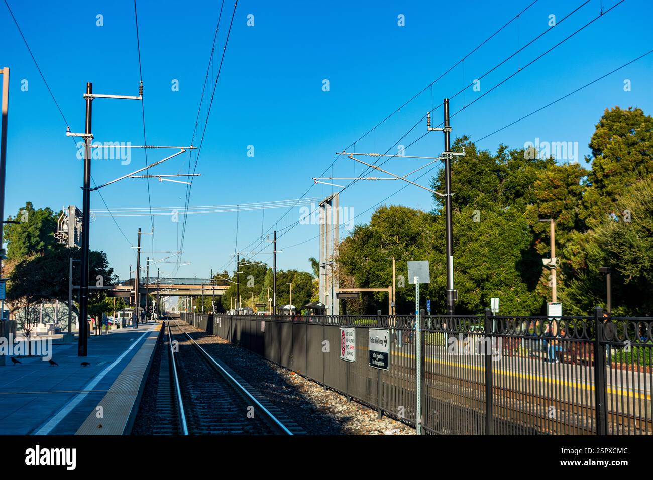 Perspective view of Caltrain tracks at Sunnyvale station, bordered by ...