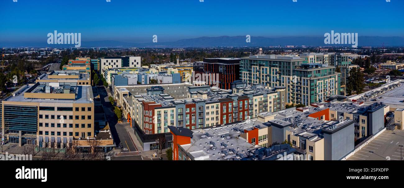 Aerial view of modern multi-story residential apartments and commercial ...