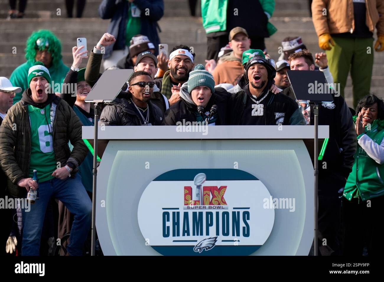 Philadelphia Eagles running back Saquon Barkley, right at podium speaks ...