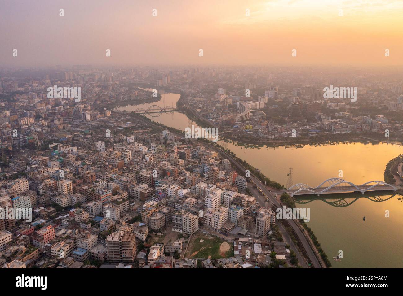 A stunning aerial view of Dhaka’s Hatirjheel area bathed in the warm ...