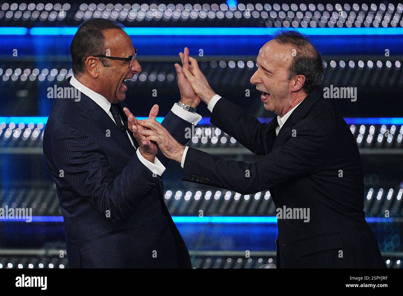 Sanremo, Italia. 14th Feb, 2025. Carlo Conti and Roberto Benigni during ...
