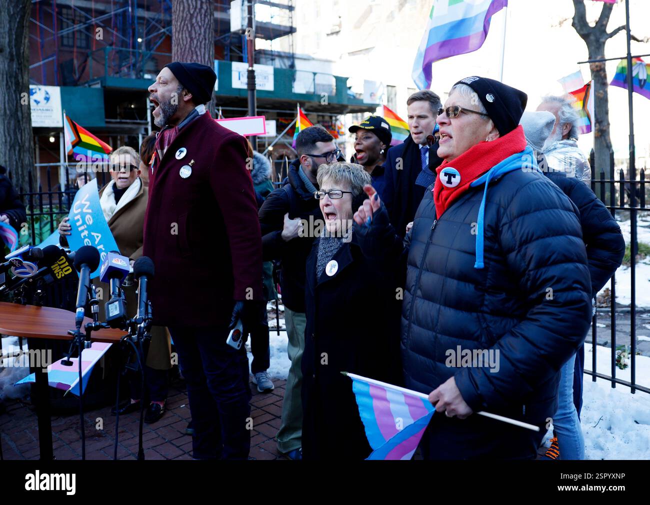 New York, United States. 14th Feb, 2025. Crowds gather holding signs ...