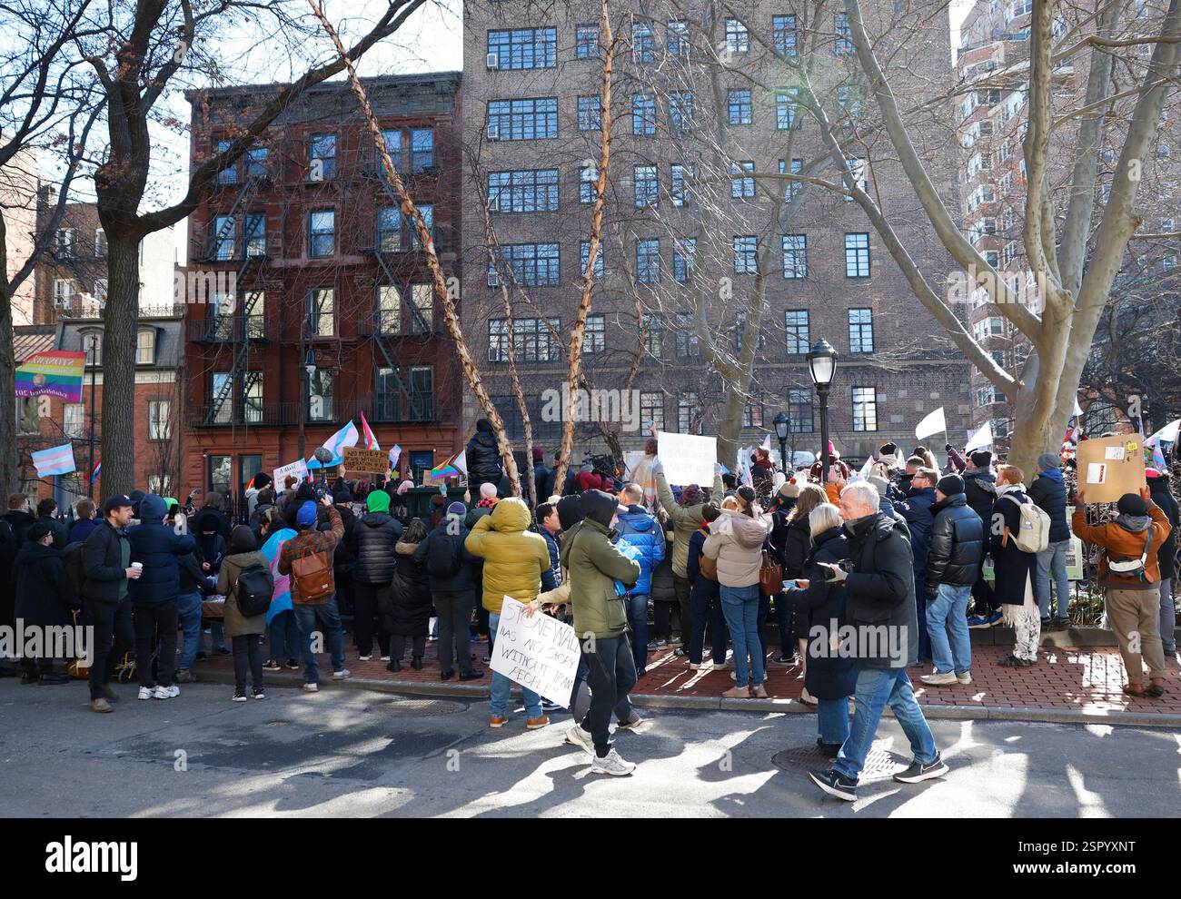 New York, United States. 14th Feb, 2025. Crowds gather and hold signs ...