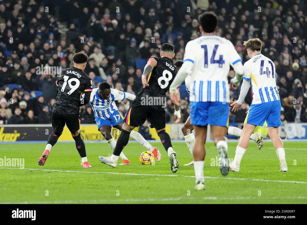 Brighton and Hove Albion's Yankuba Minteh (second left) scores their ...