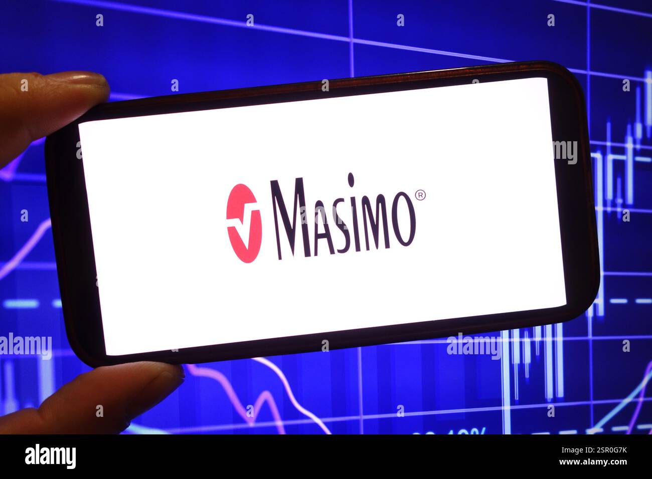 In this photo illustration, the Masimo Corporation company logo is seen displayed on a ...