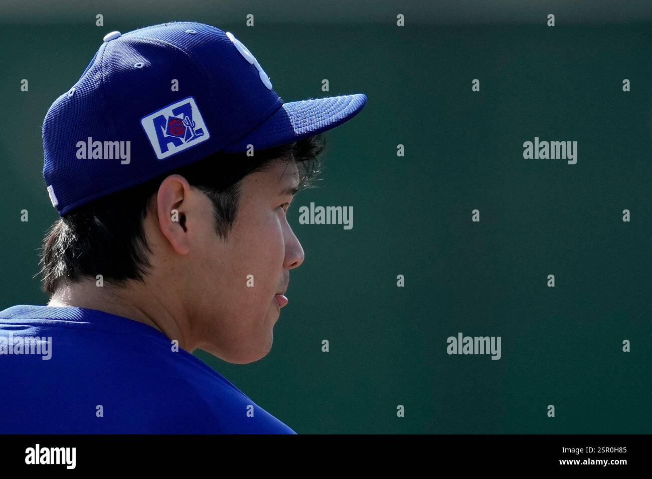 Los Angeles Dodgers' Shohei Ohtani, of Japan, runs drills during a ...