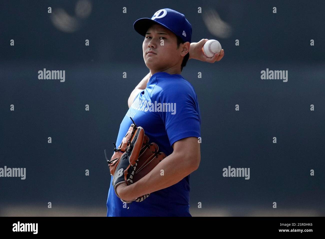 Los Angeles Dodgers' Shohei Ohtani, of Japan, runs drills during a ...